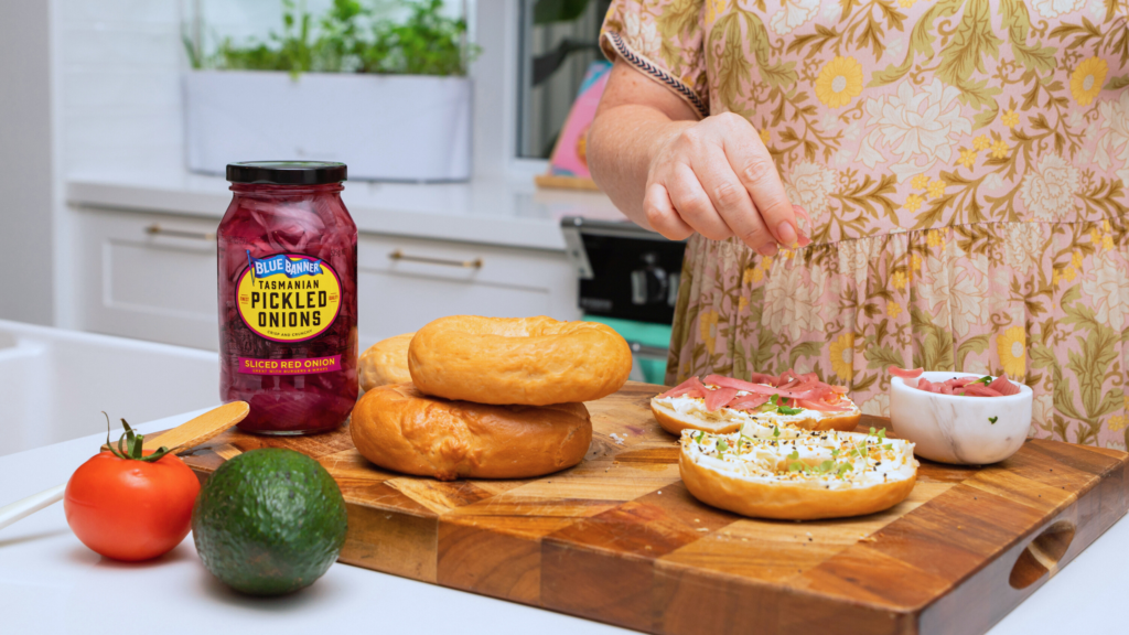 Bagel & Sliced Red Onion - Blue Banner